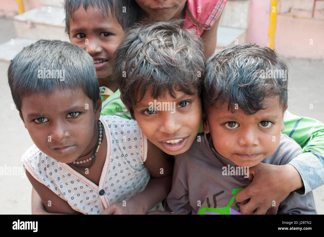 India, Ganges River, Chandravila portrait of four young children Stock ...