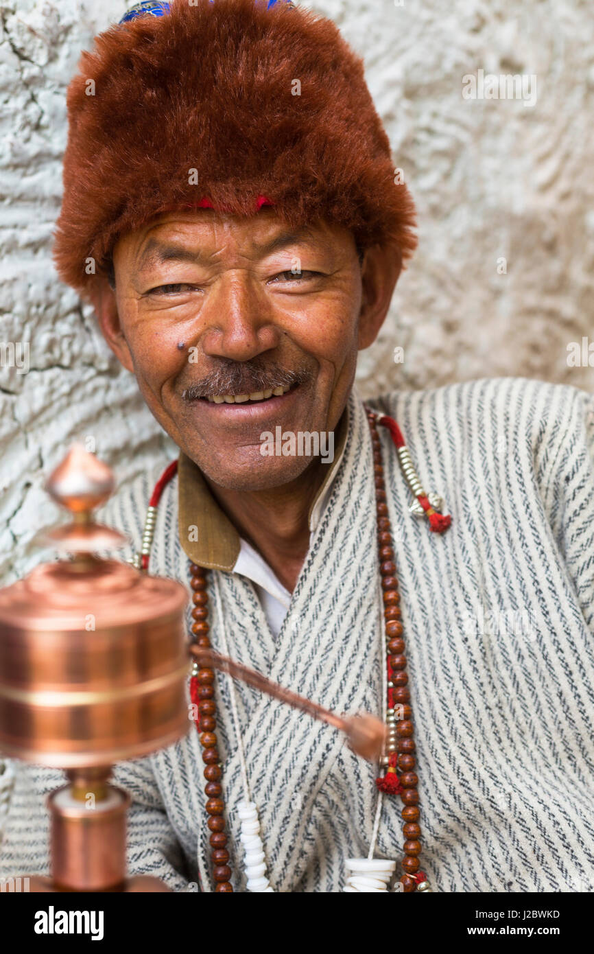Ladakhi man with prayer wheel, Ladakh, India Stock Photo - Alamy