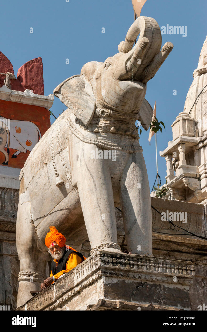 Man sitting under Elephant statue. Udaipur Rajasthan. India Stock Photo ...