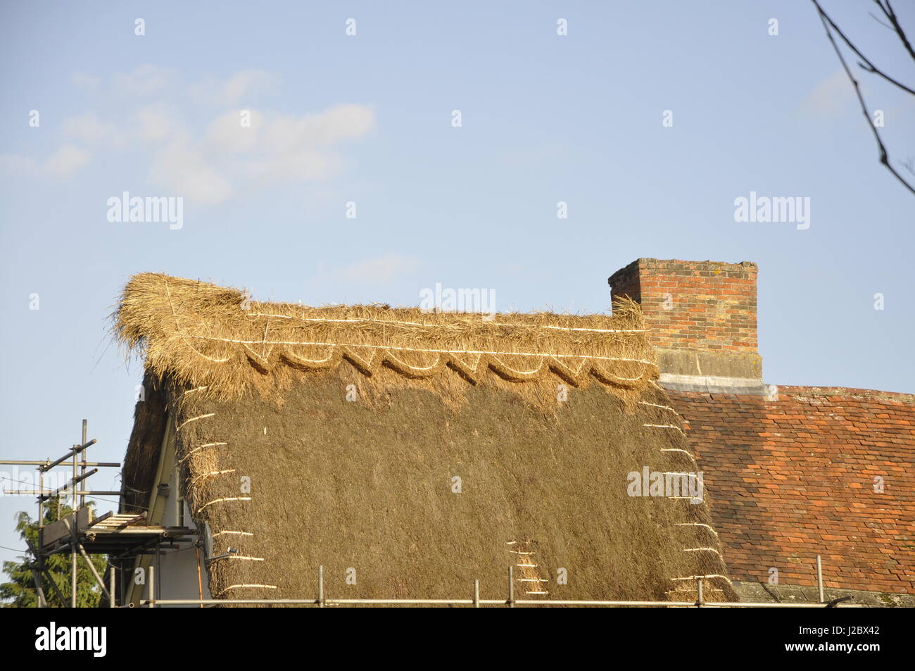 roof being thatched Stock Photo - Alamy
