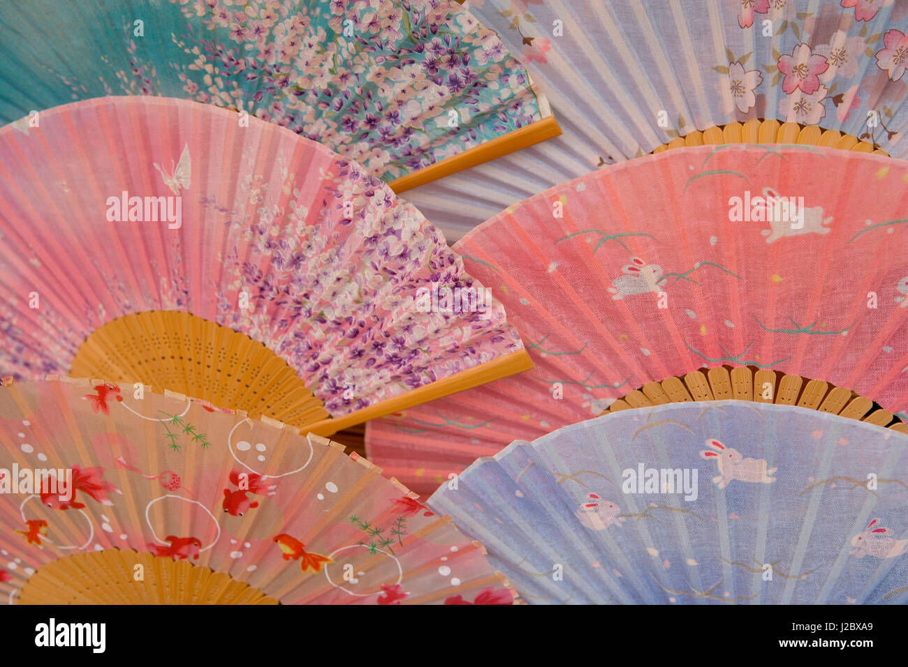 Hand fans hi-res stock photography and images - Alamy