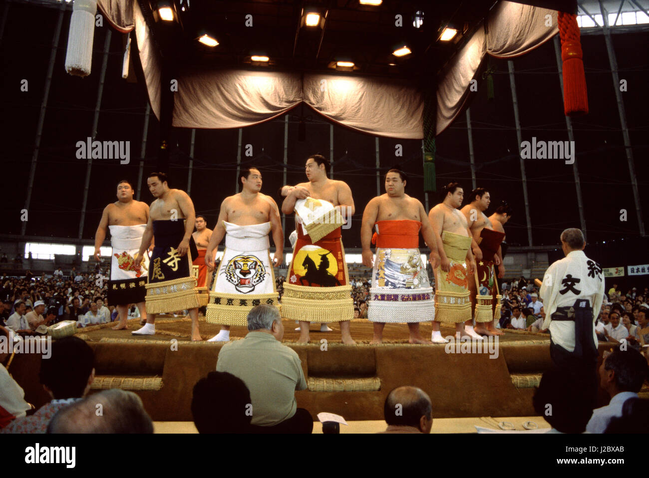 Sumo Wrestlers pose for the cameras before a day's wrestling in Sapporo ...