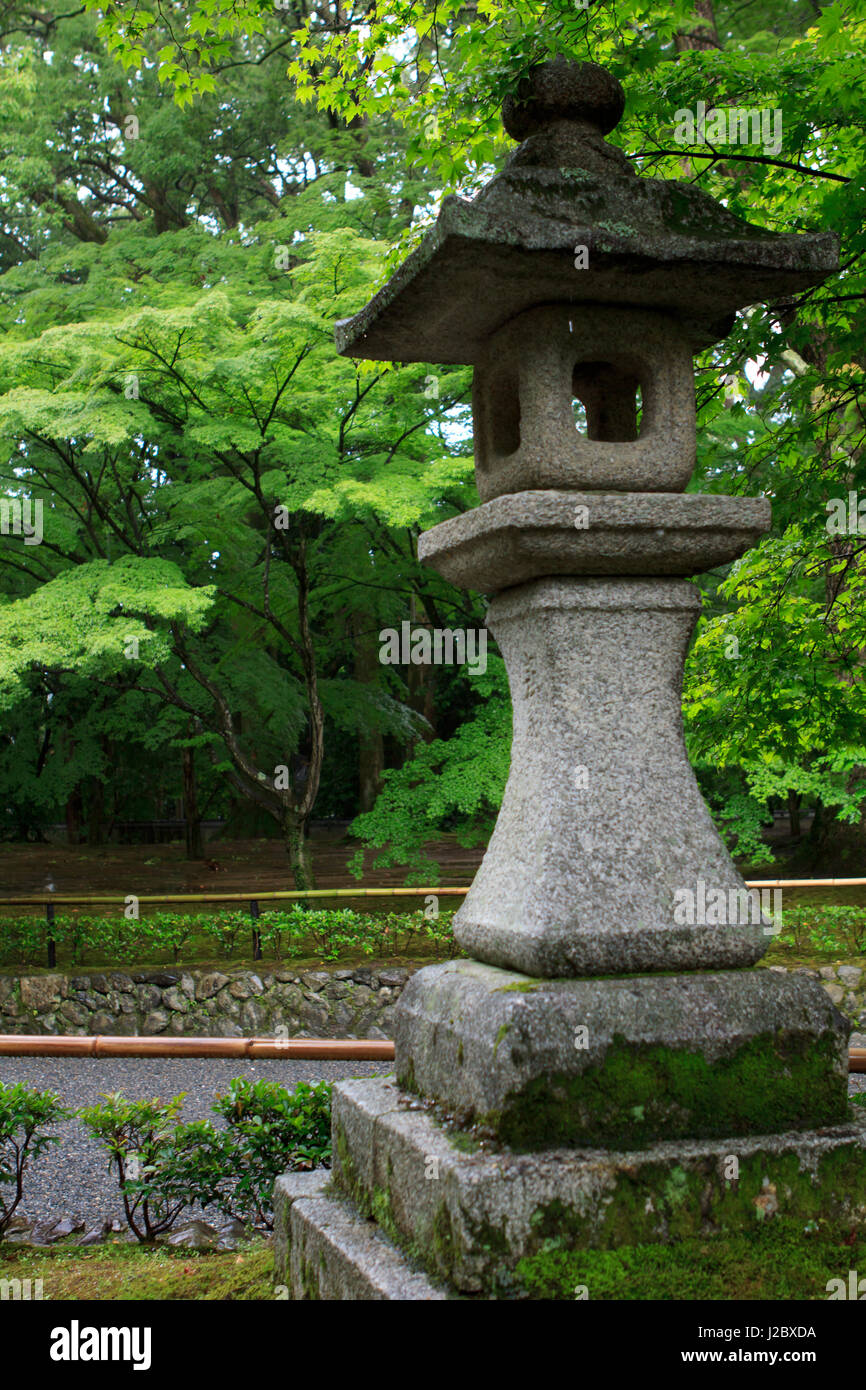 A traditional Japanese lantern marks the path towards the Golden Temple ...