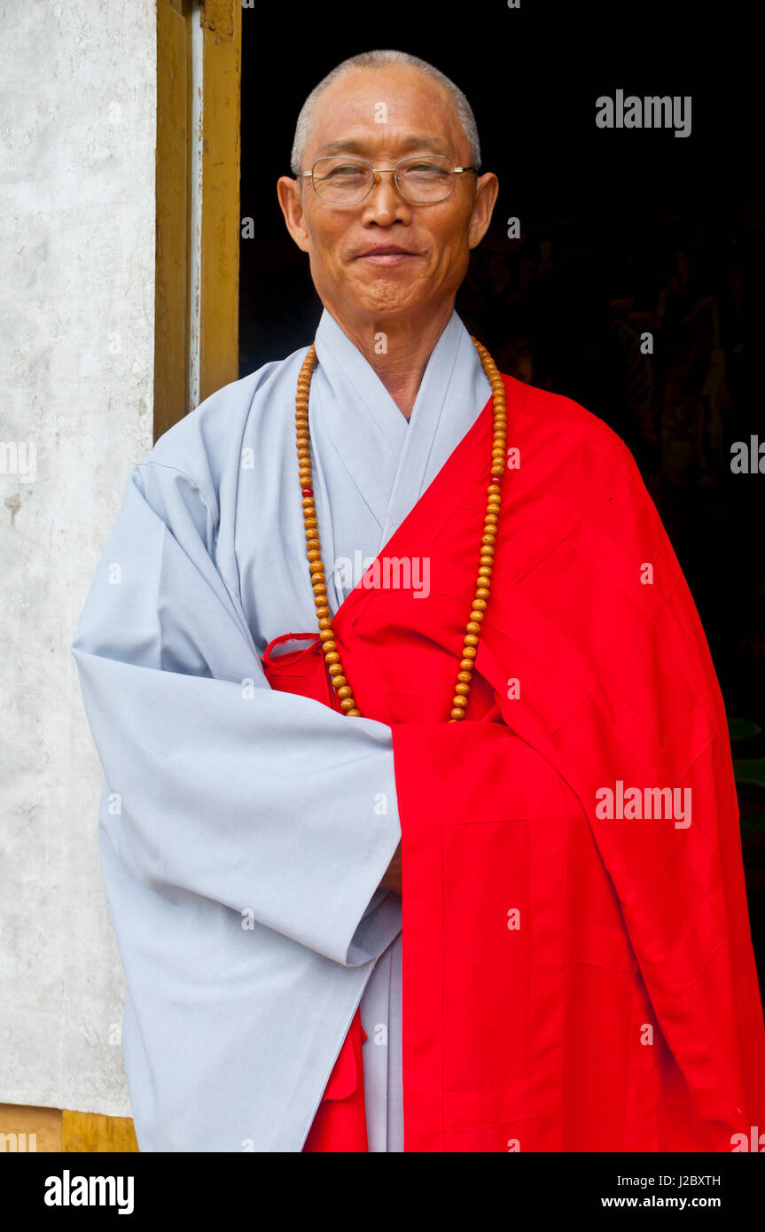 Old monk in the Buddhist Pohyon-temple, Mount Myohyang-san, North Korea ...
