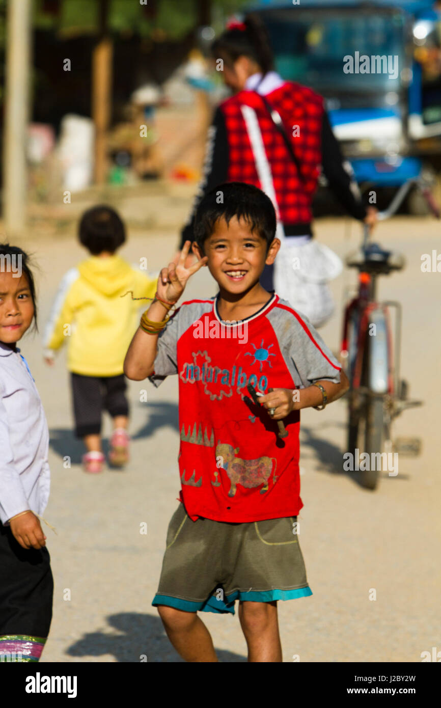 Kids play for the camera in a remote northern Laos village called Vieng ...