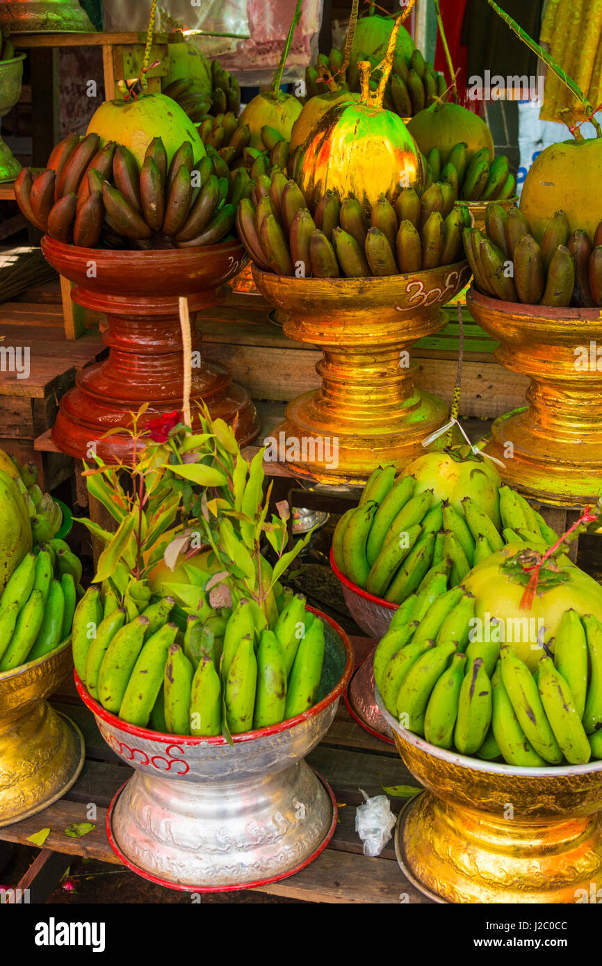 Myanmar. Yangon. Botataung Pagoda. Offerings of bananas and cocoanuts ...