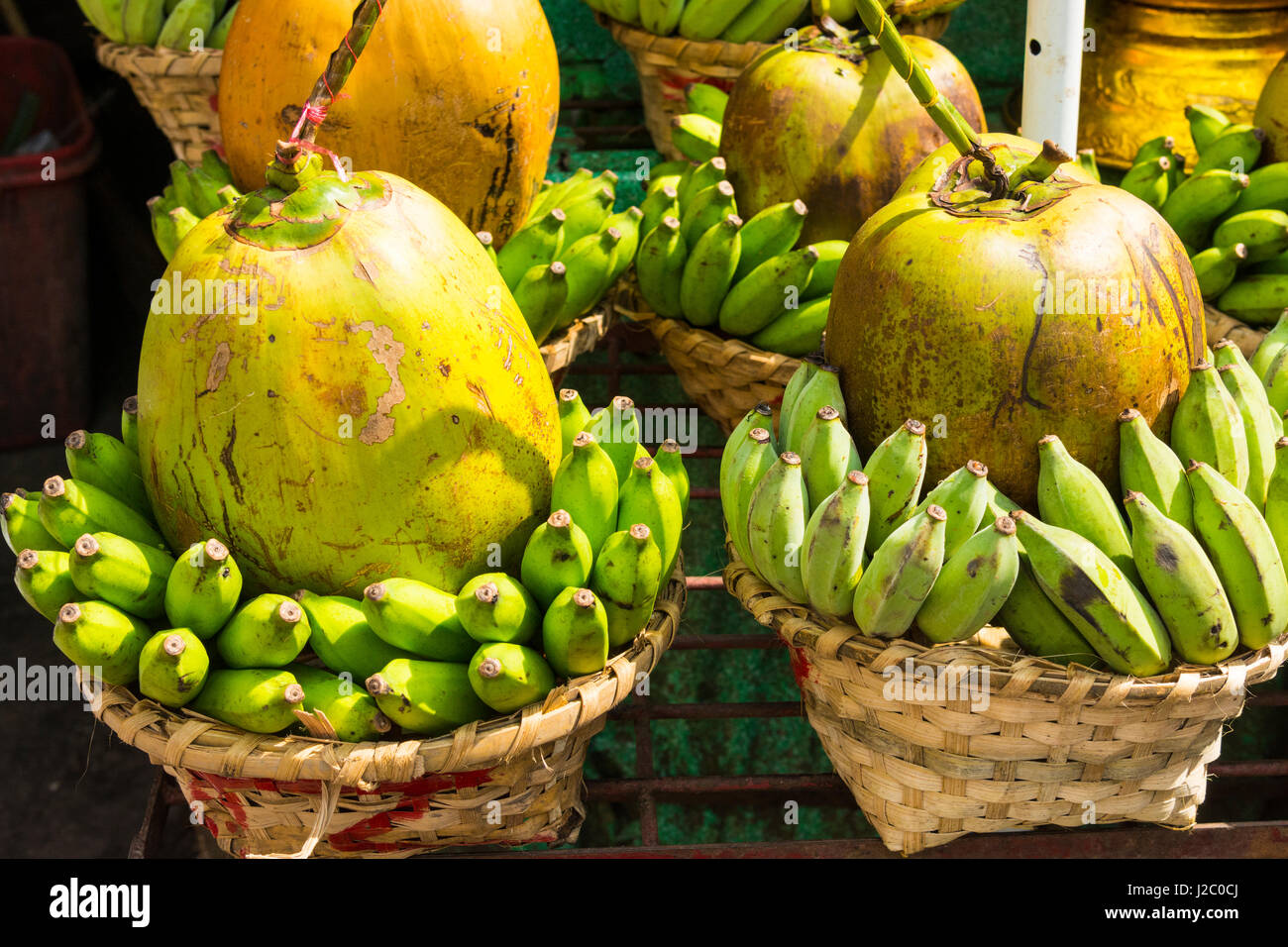 Myanmar. Yangon. Botataung Pagoda. Offerings of bananas and cocoanuts ...