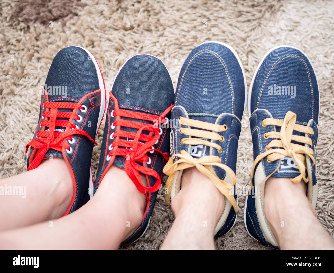 Shoes of Happy Couple Stock Photo - Alamy