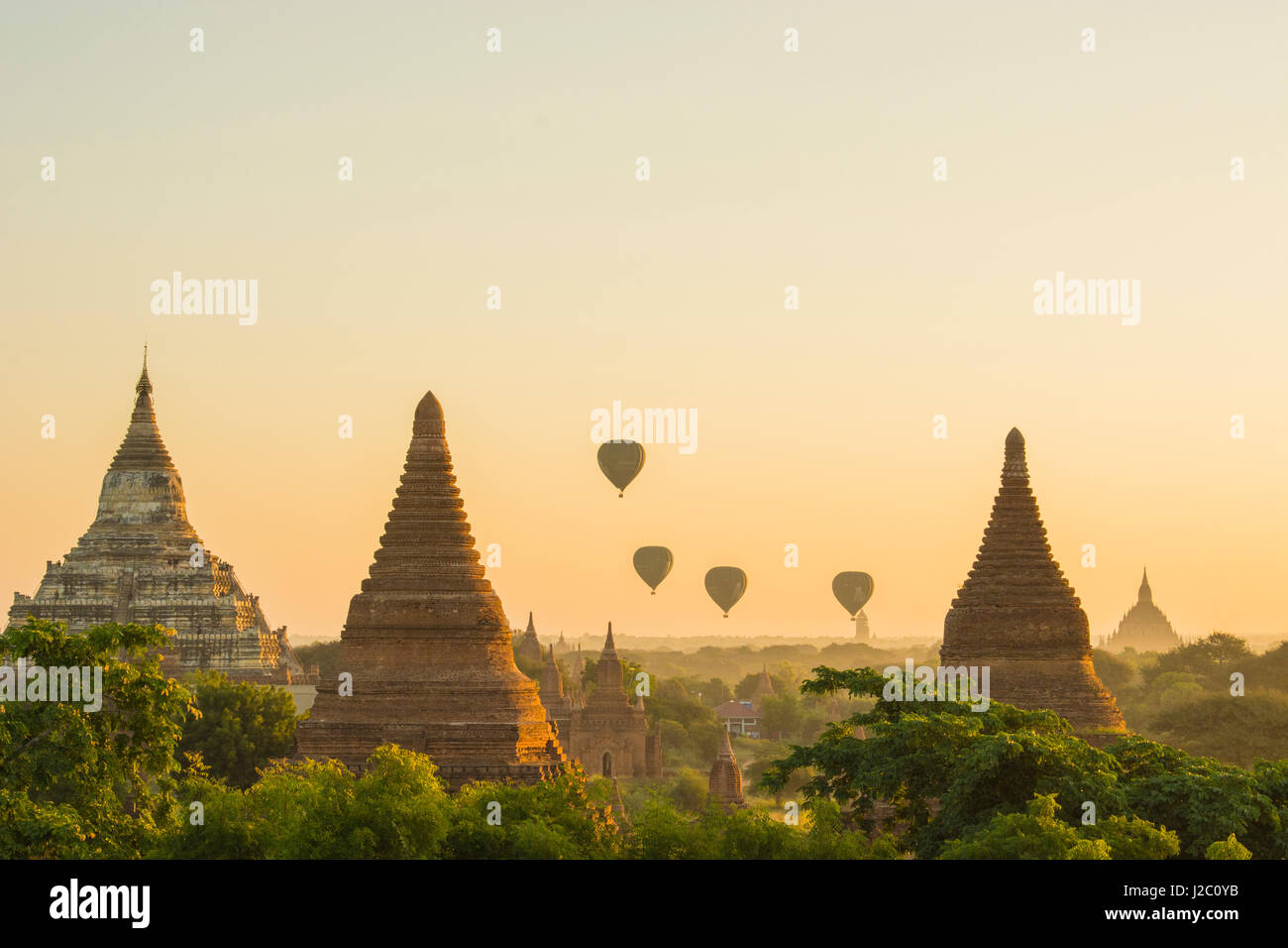 Myanmar. Bagan. Hot air balloons rising over the temples of Bagan Stock ...