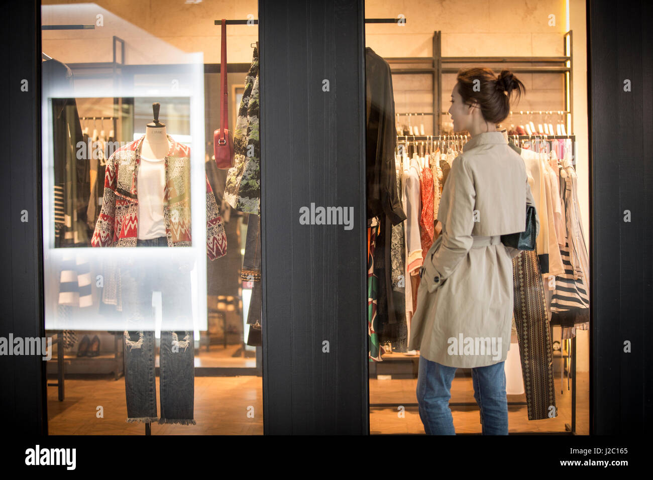 Back of female designer Stock Photo - Alamy