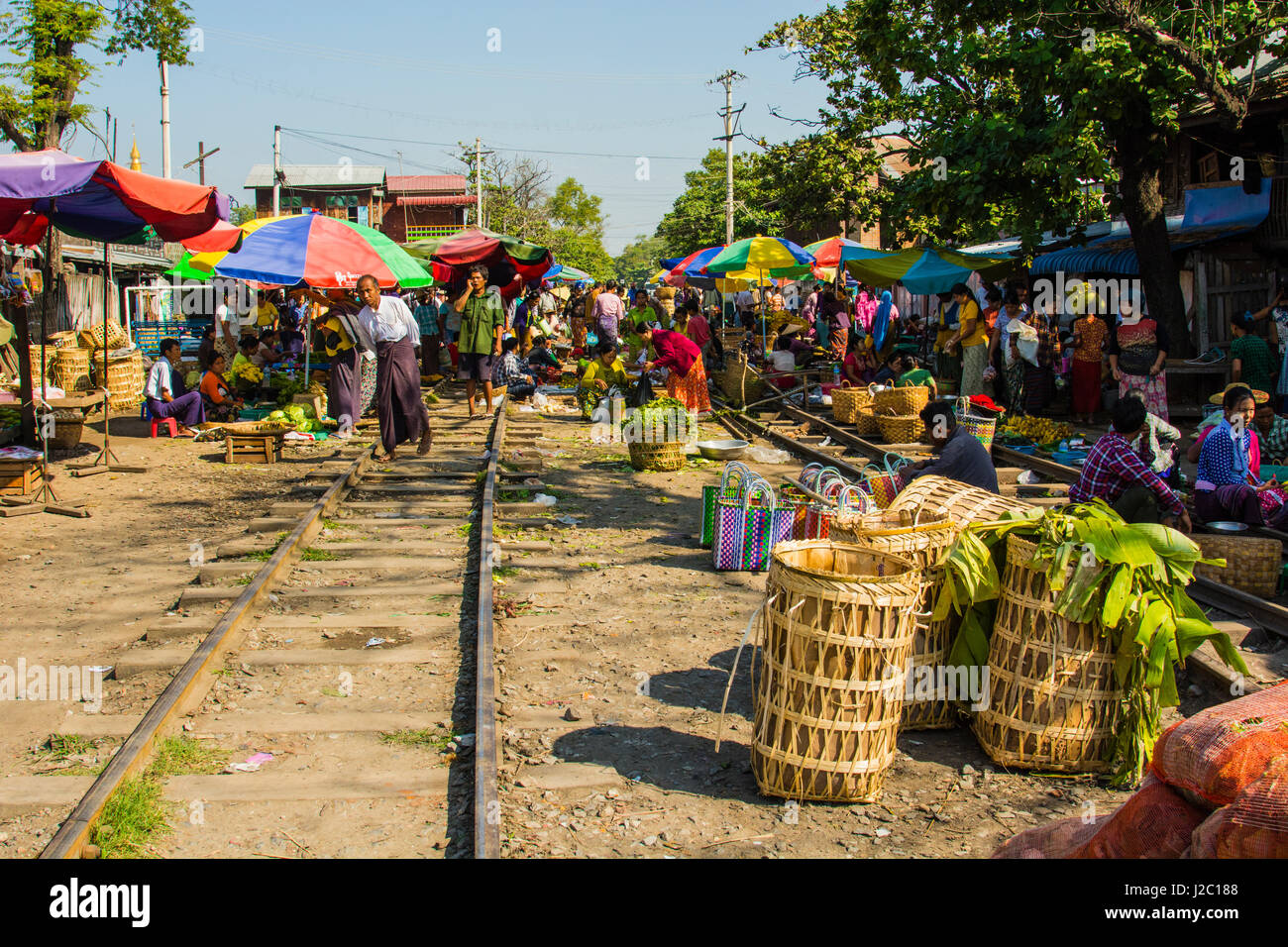 Myanmar. Mandalay. Market on an active railway line Stock Photo - Alamy