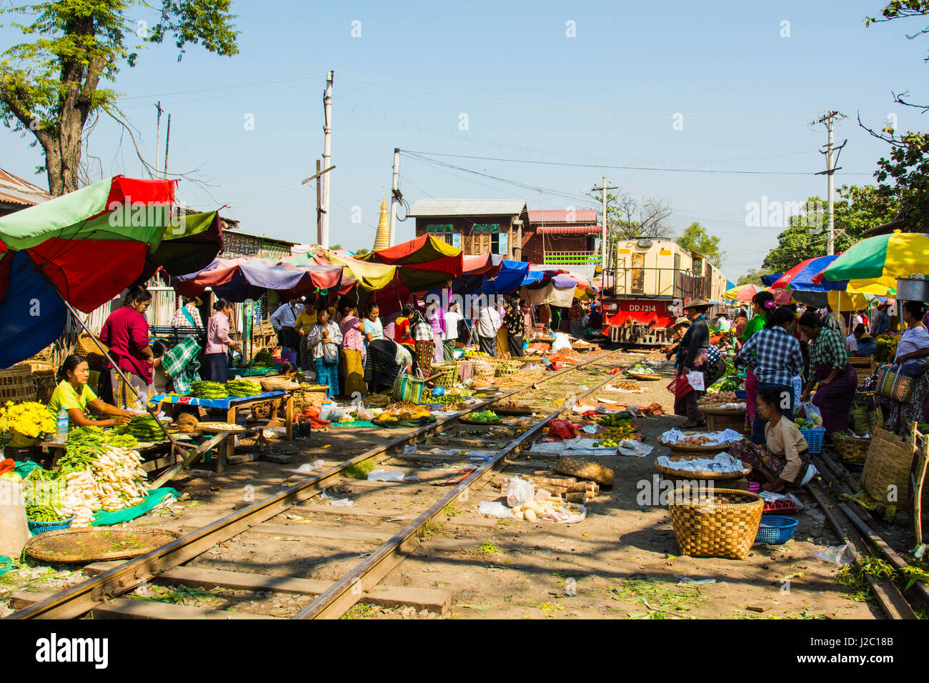 Myanmar. Mandalay. Market on an active railway line Stock Photo - Alamy