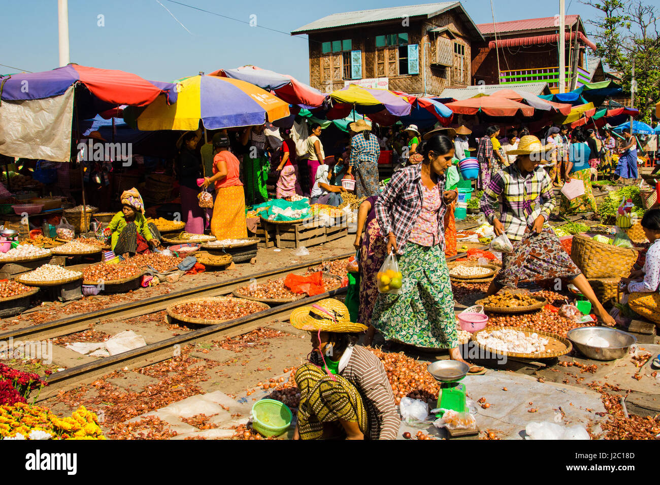 Myanmar. Mandalay. Market on an active railway line Stock Photo - Alamy