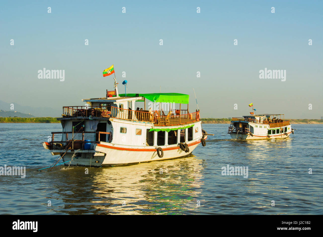 Myanmar. Mandalay. Irrawaddy River. Houseboat on the river Stock Photo ...