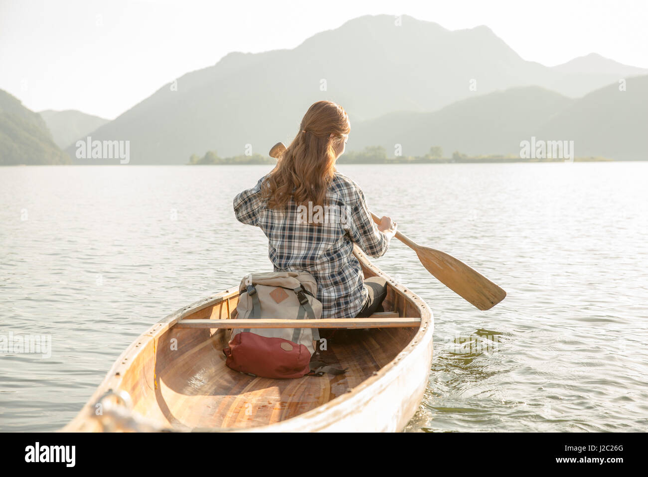Young woman paddling hi-res stock photography and images - Alamy