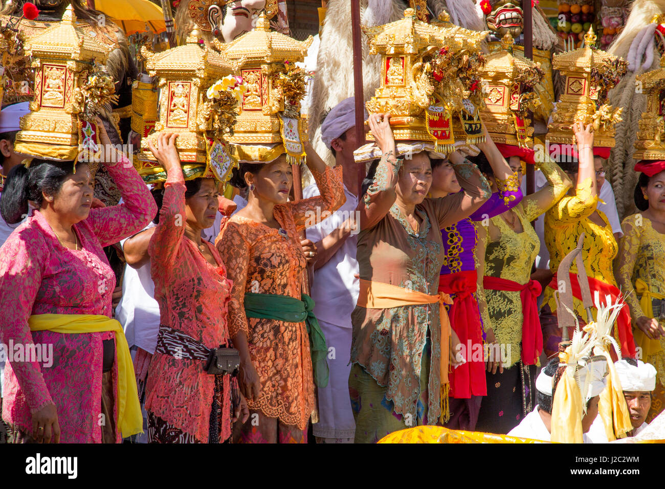 Indonesia, Bali. Participants in the Hindu Temple festival enter the ...