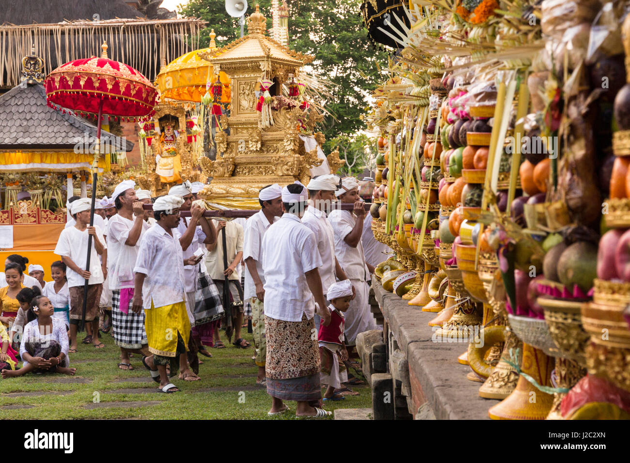Indonesia, Bali. Villagers depart following sacred celebration at Hindu ...