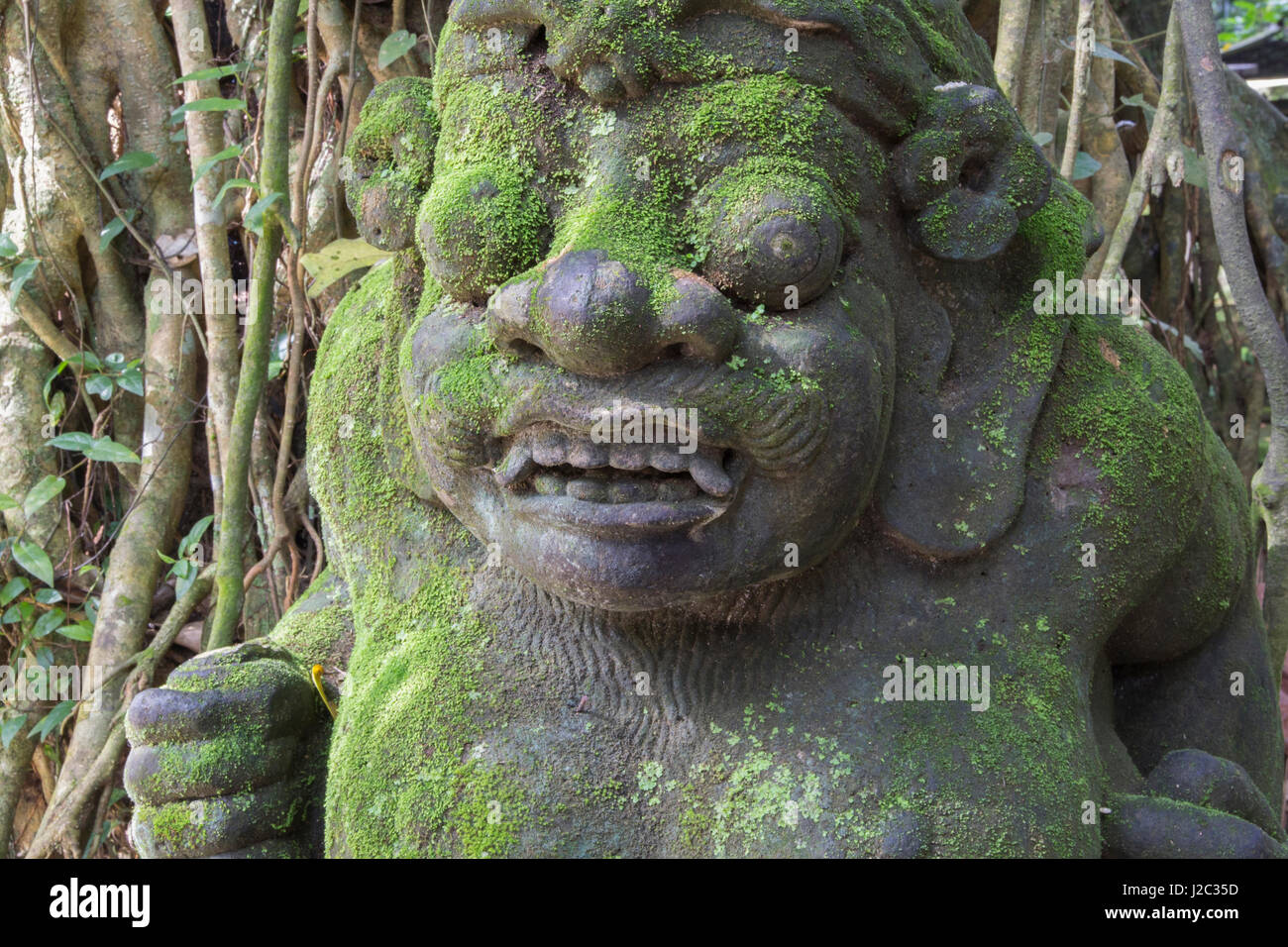 Indonesia, Bali. Temple Statue in the Monkey Forest of Padangtegal, a ...