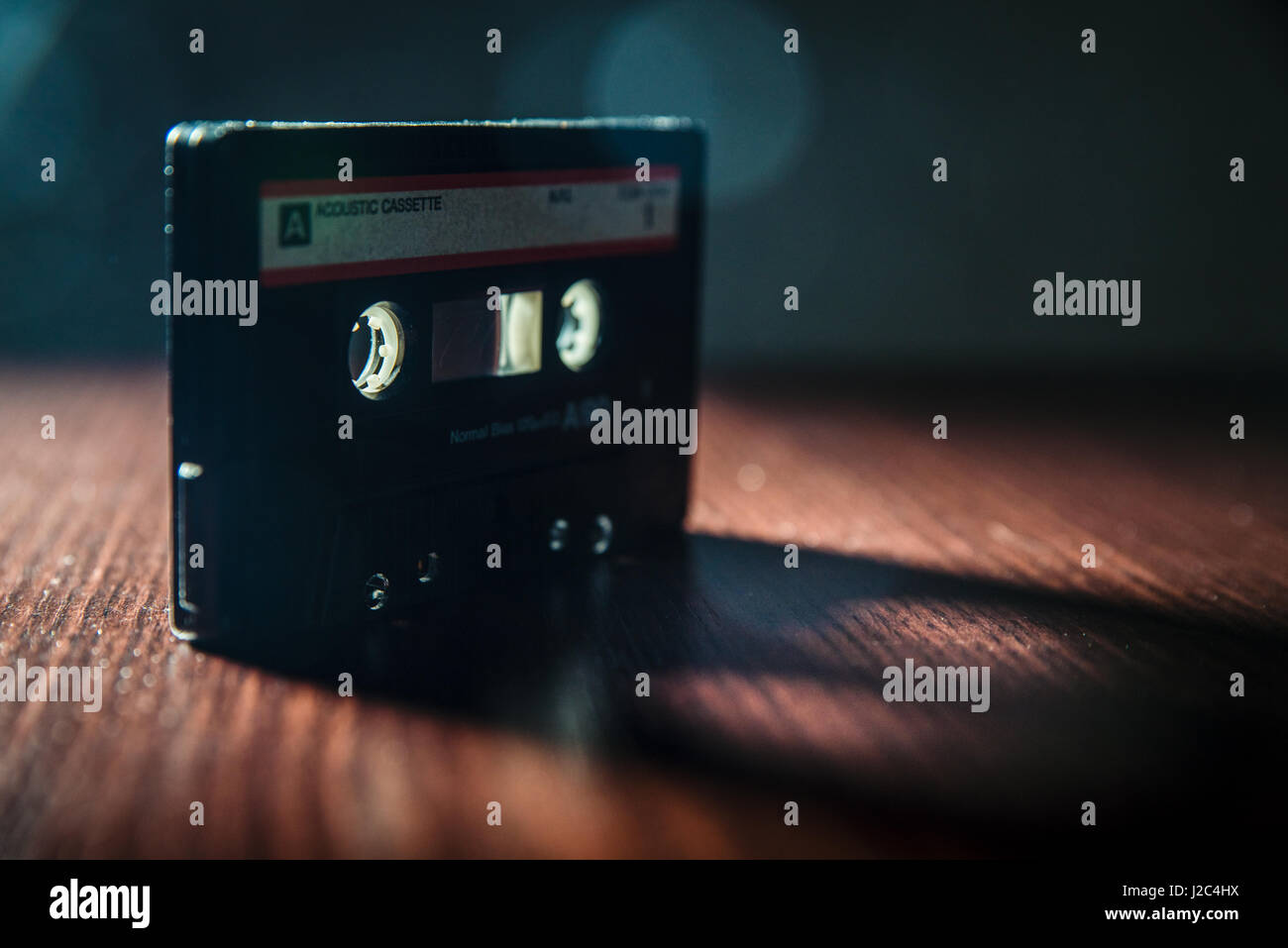 Old-fashioned cassette tape on the dark surface Stock Photo - Alamy
