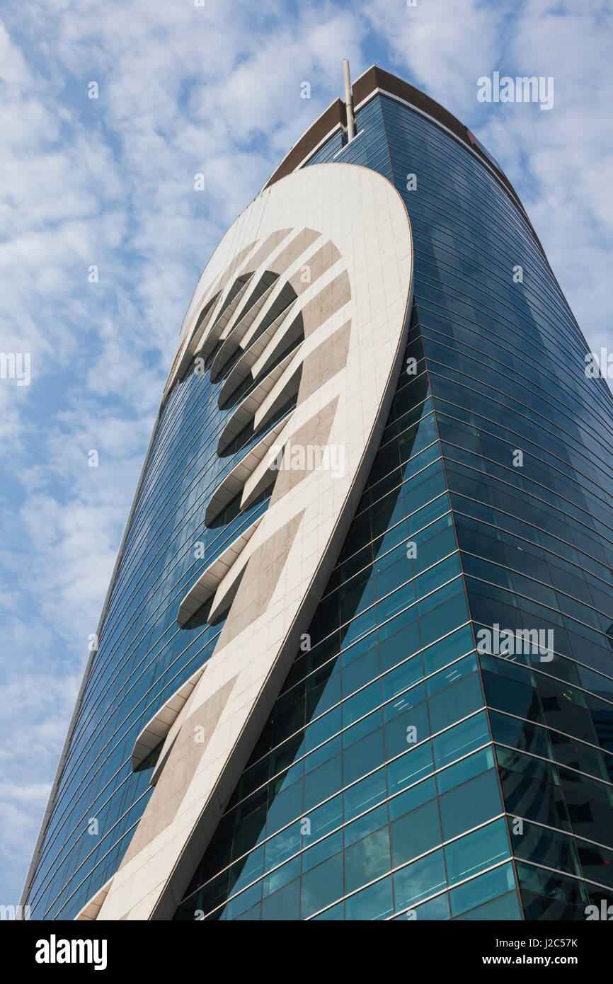 Qatar, Doha, Doha Bay, West Bay skyscrapers, Doha Bank Tower, dusk ...