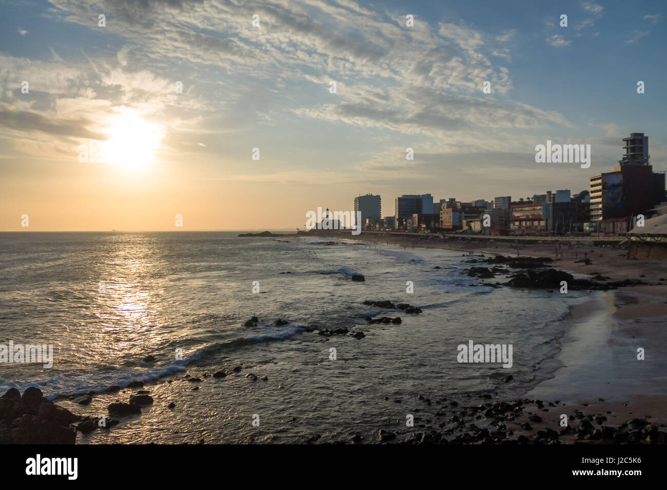 Sunset at Barra Beach with Farol da Barra (Barra Lightouse) on ...