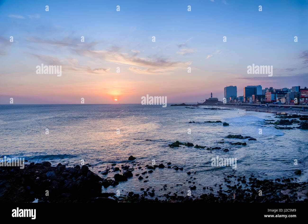 Sunset at Barra Beach with Farol da Barra (Barra Lightouse) on ...