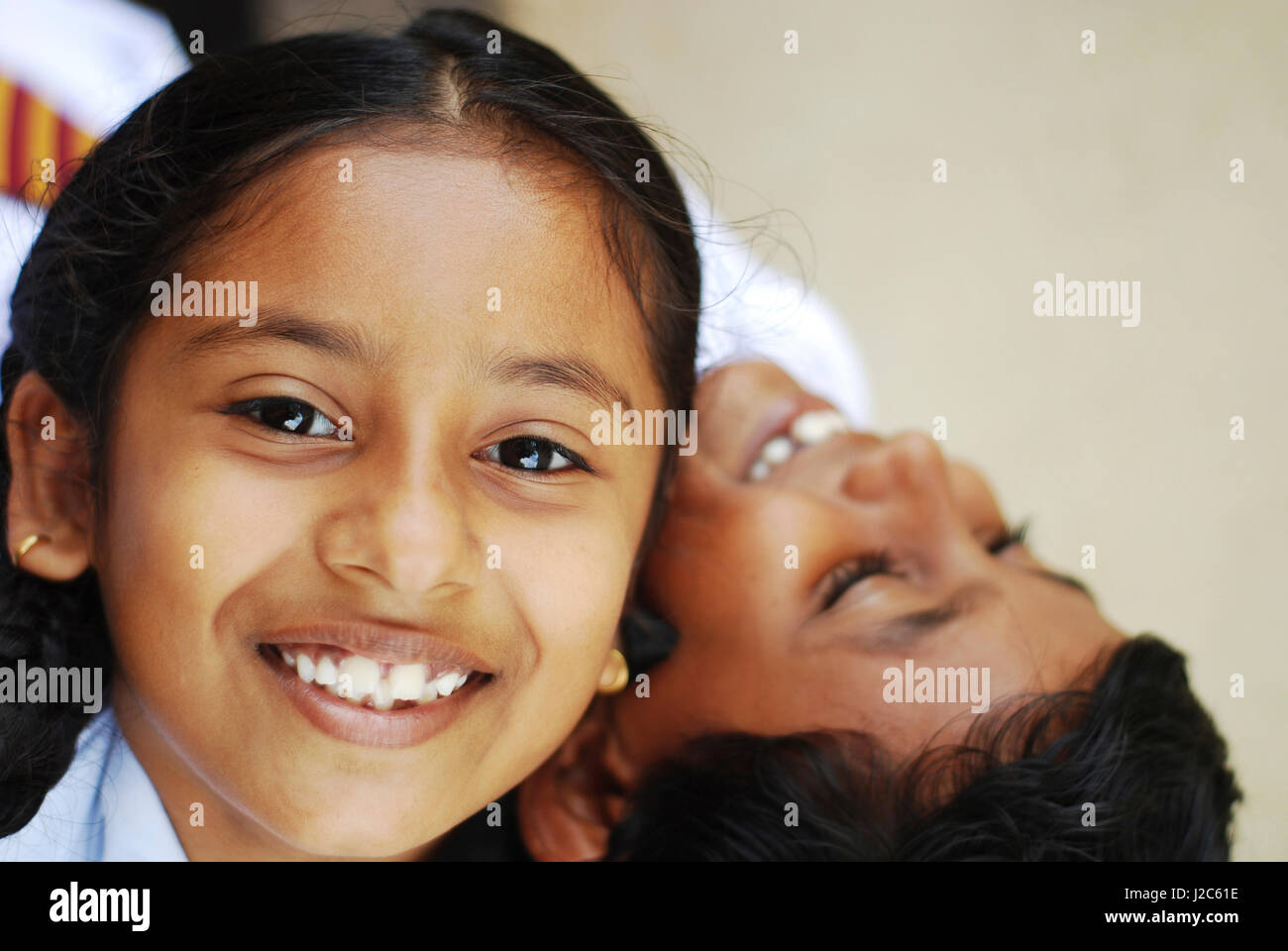 Sri Lanka, Colombo, portrait of 2 smiling schoolgirls (MR Stock Photo ...