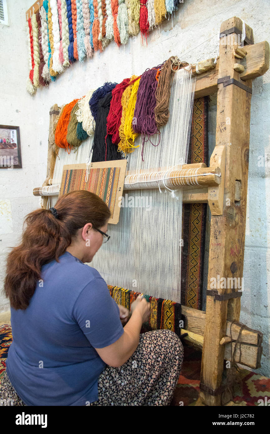 Turkey, Cappadocia, Nevsehir, Urgup. Turkish Carpet weaving is one of ...
