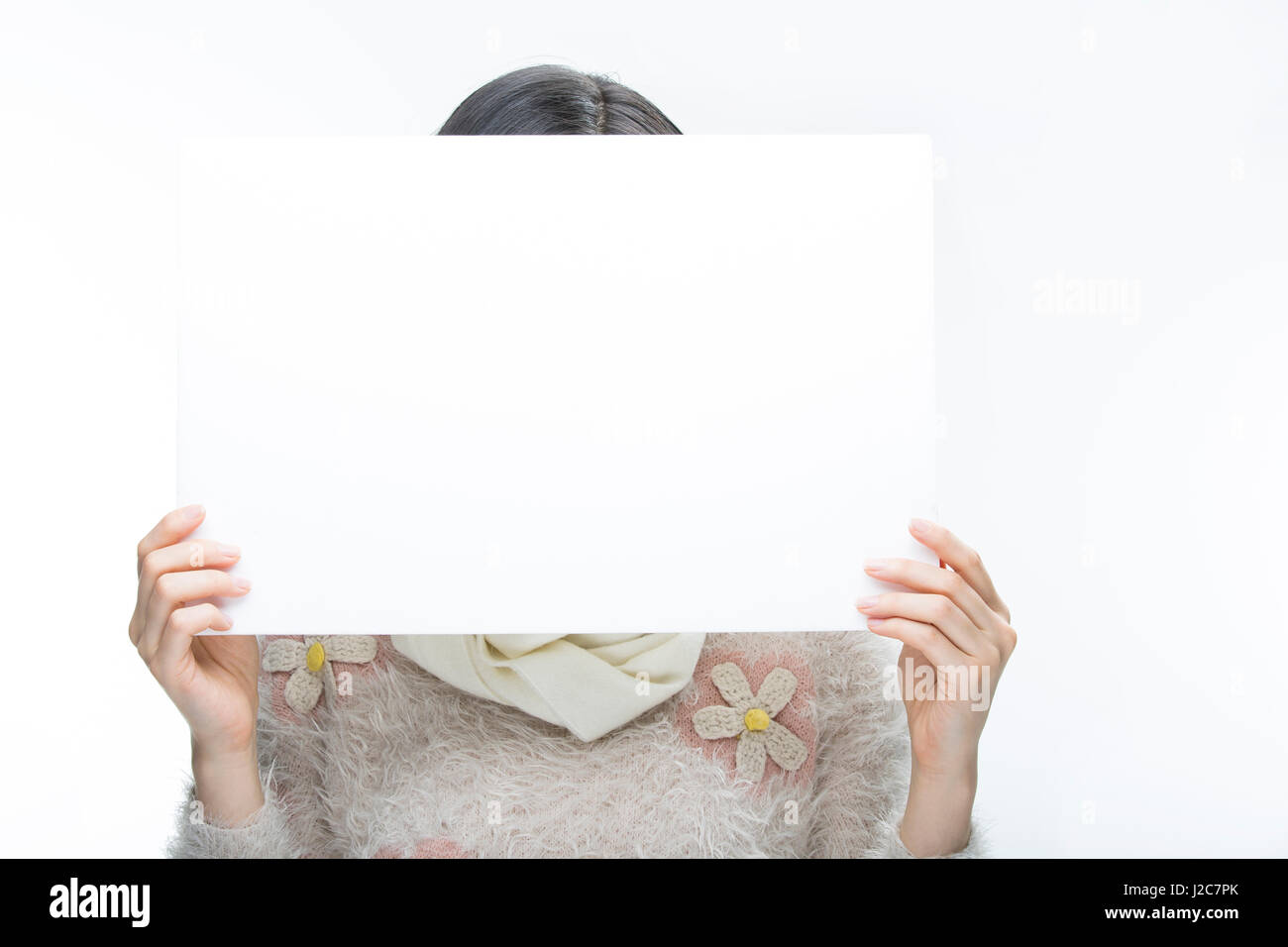 Woman covering her face placard hi-res stock photography and images - Alamy