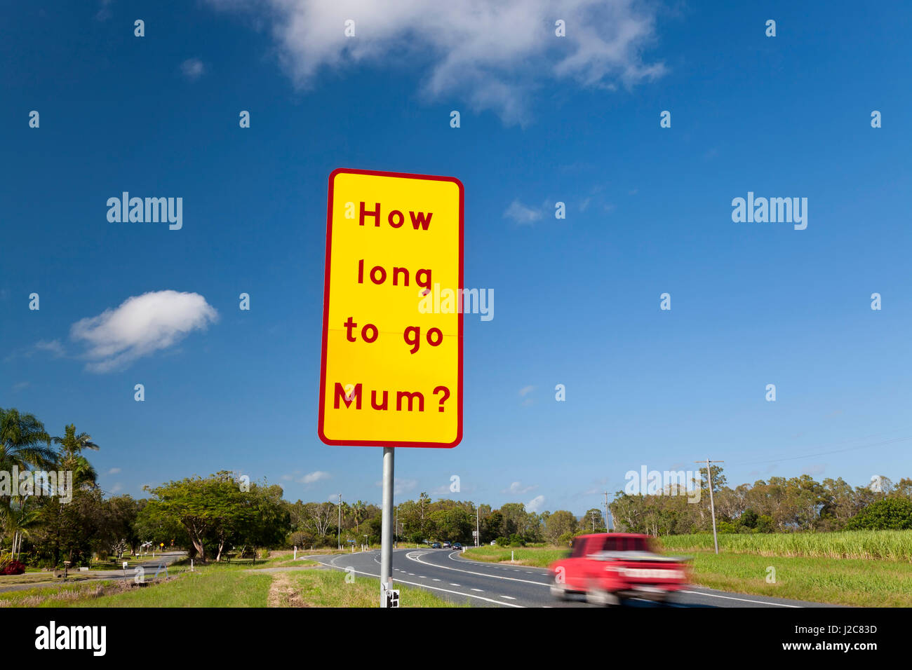 'How long to go Mum' road sign, Queensland, Australia Stock Photo - Alamy