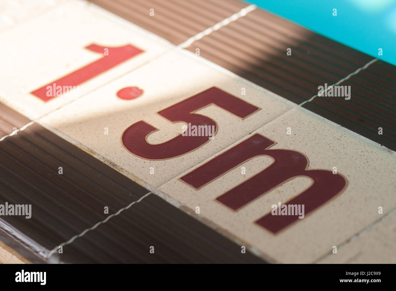 Swimming pool depth numbers hi-res stock photography and images - Alamy