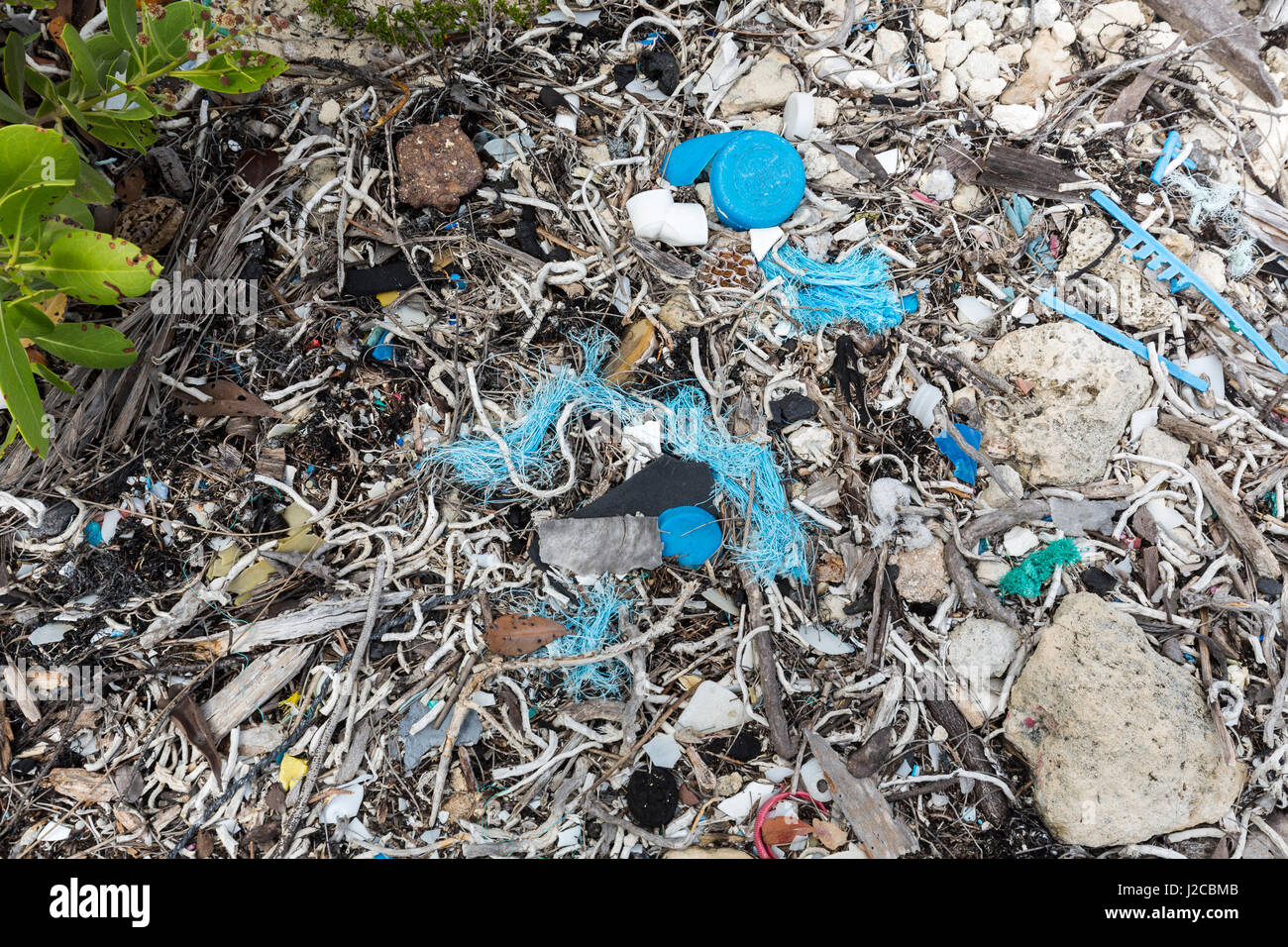 Plastic debris and other trash washed up on the beach of Staniel Cay ...