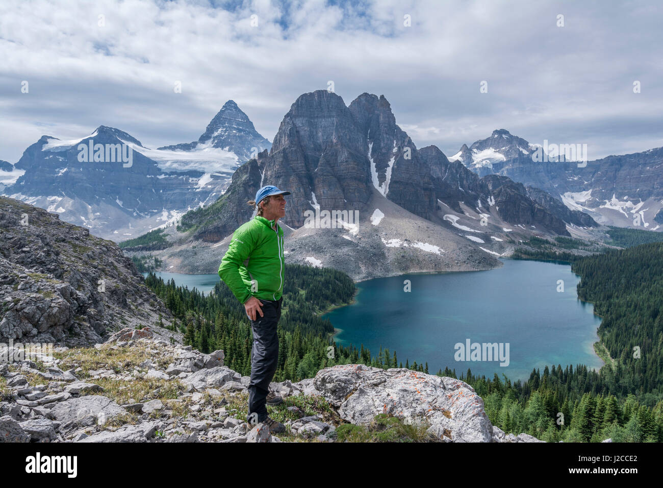 Hiker on the Nub, Mt. Assiniboine Provincial Park, Canada Stock Photo ...