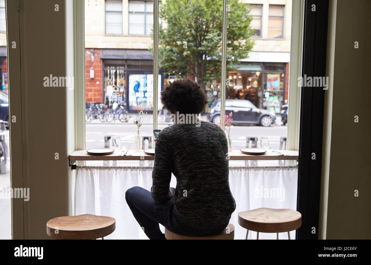 Coffee shop window from behind hi-res stock photography and images - Alamy