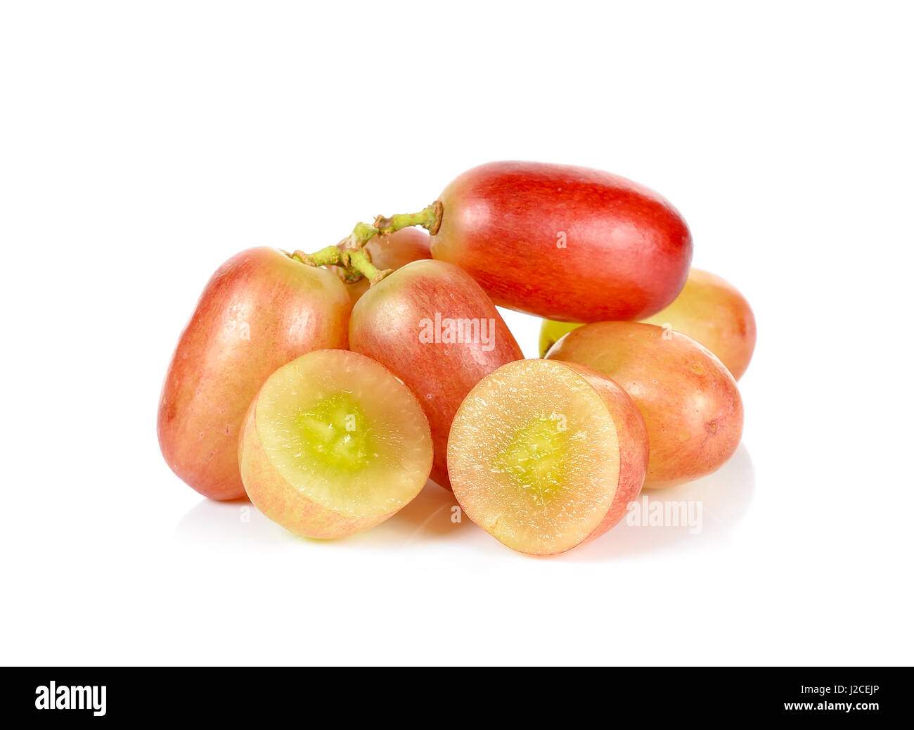 Sliced grape isolated on over white background Stock Photo - Alamy
