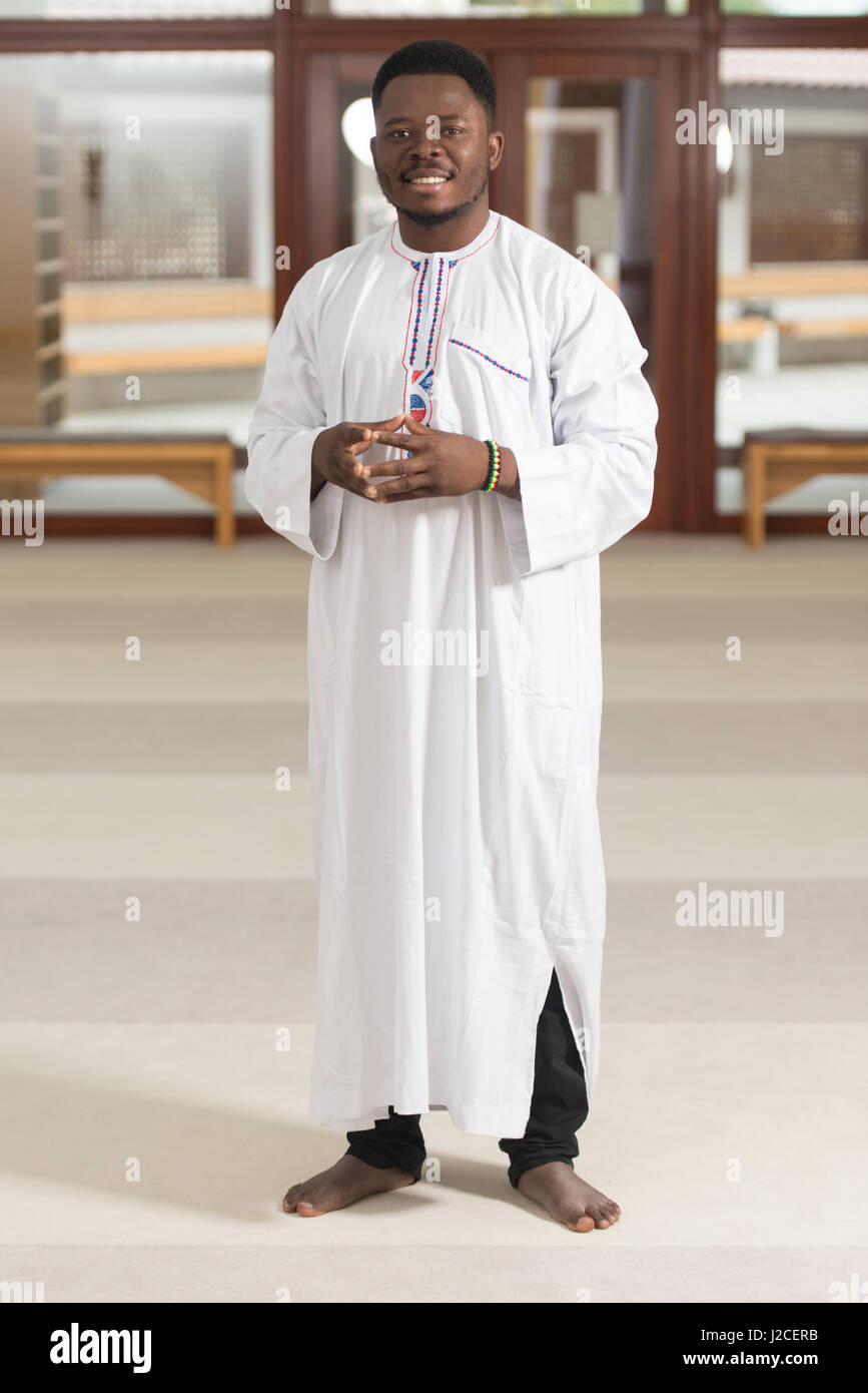 Portrait Of A African Muslim Man Making Traditional Prayer To God While ...