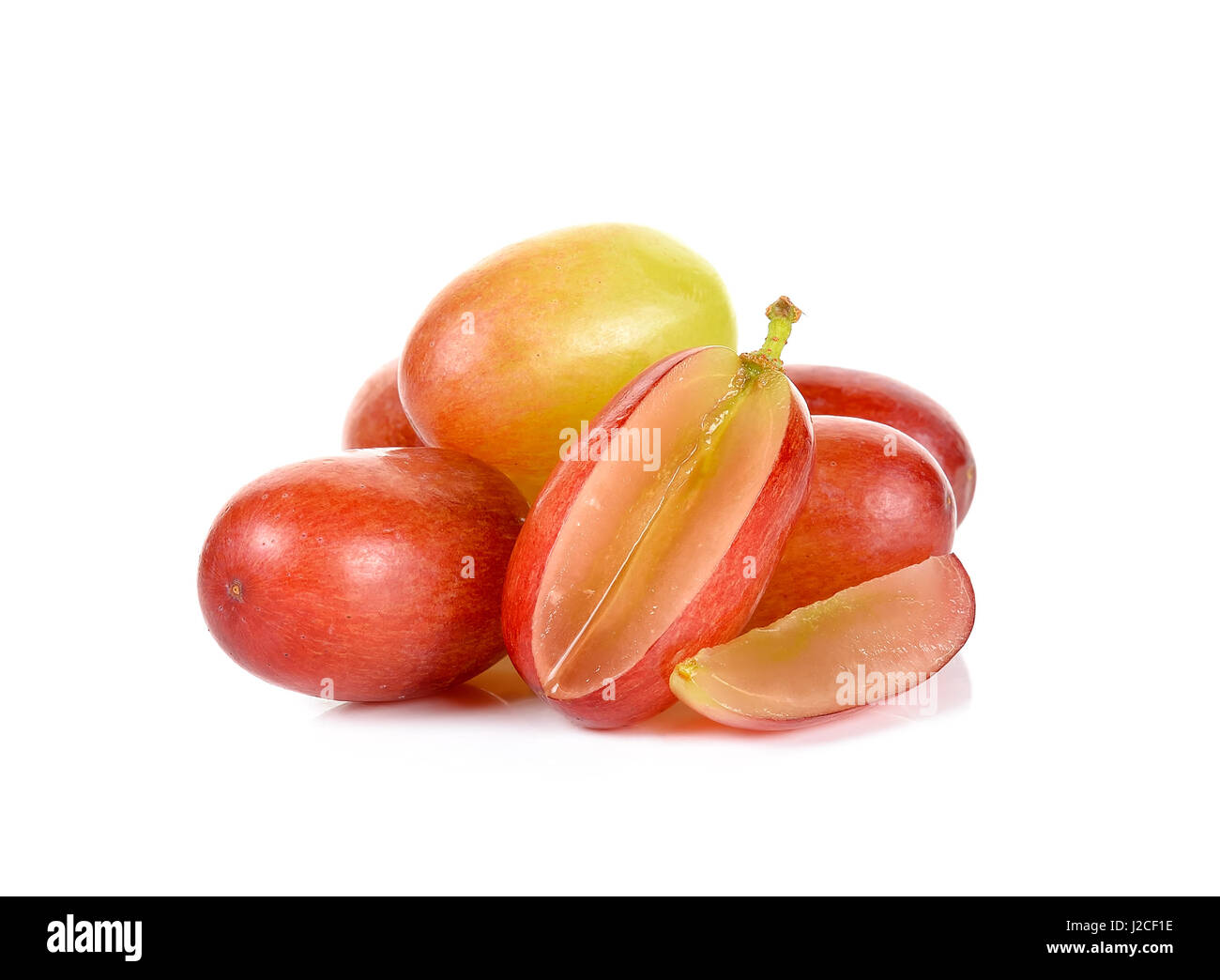 Sliced grape isolated on over white background Stock Photo - Alamy