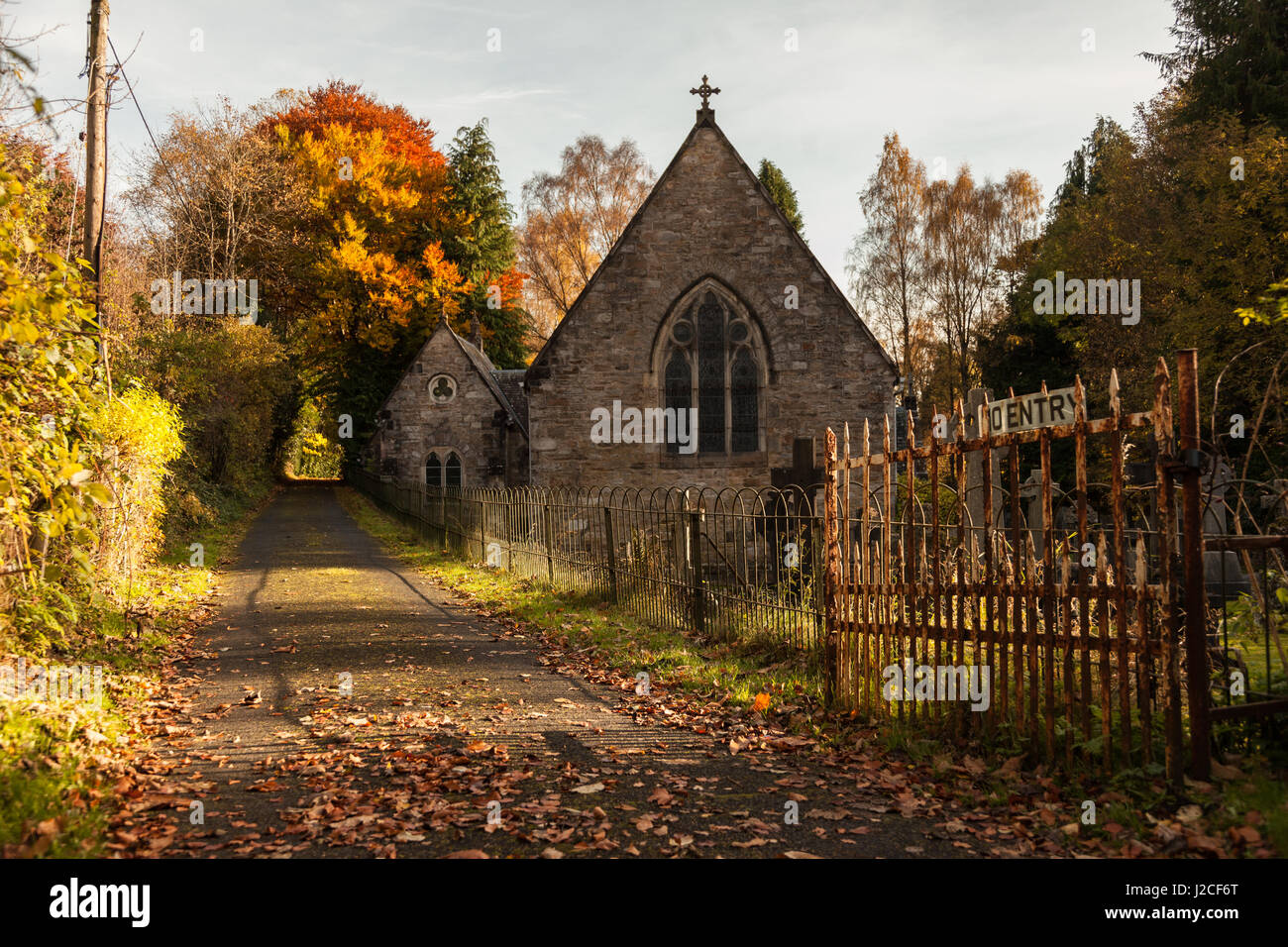 The Holy Trinity church in Pitlochry bathed in evening sunlight ...