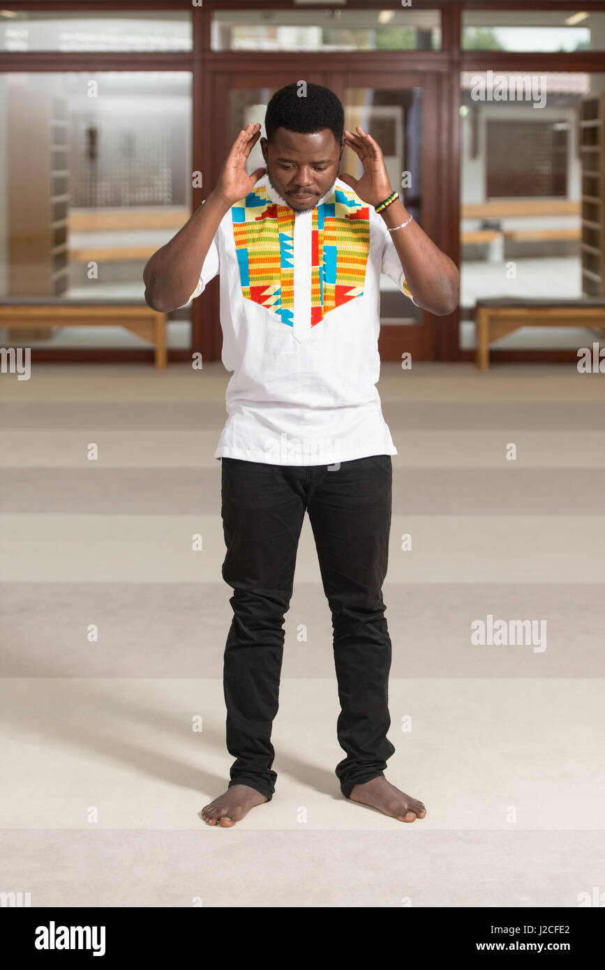 Black African Muslim Man Is Praying In The Mosque Stock Photo - Alamy