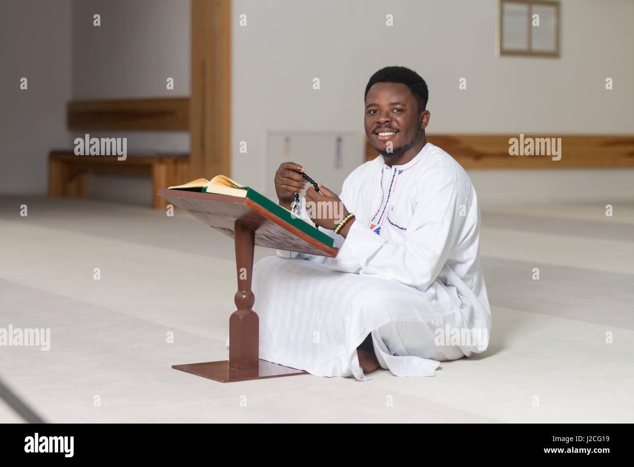 Muslim man quran african young hi-res stock photography and images - Alamy