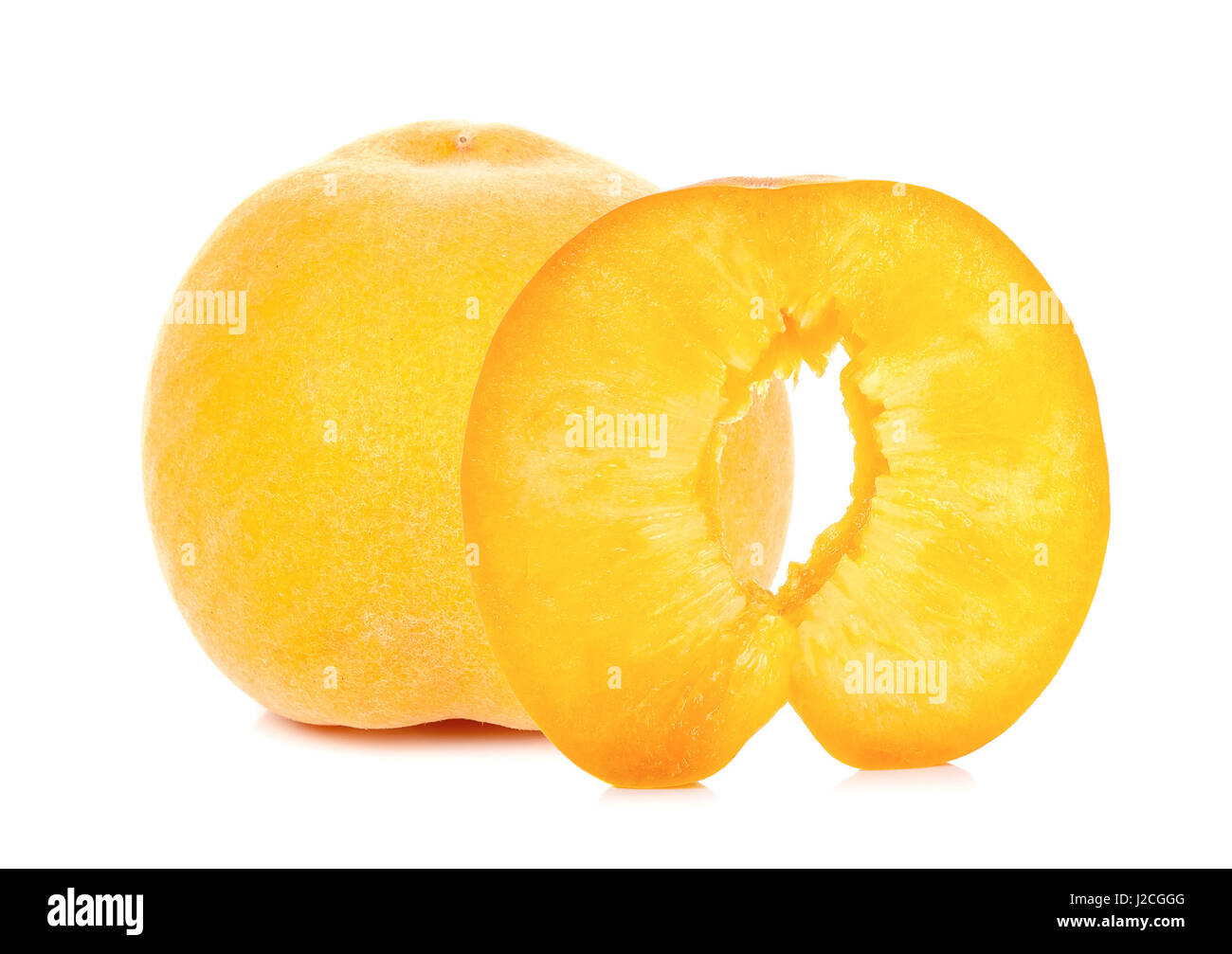 Yellow peach with sliced isolated on the white background Stock Photo ...