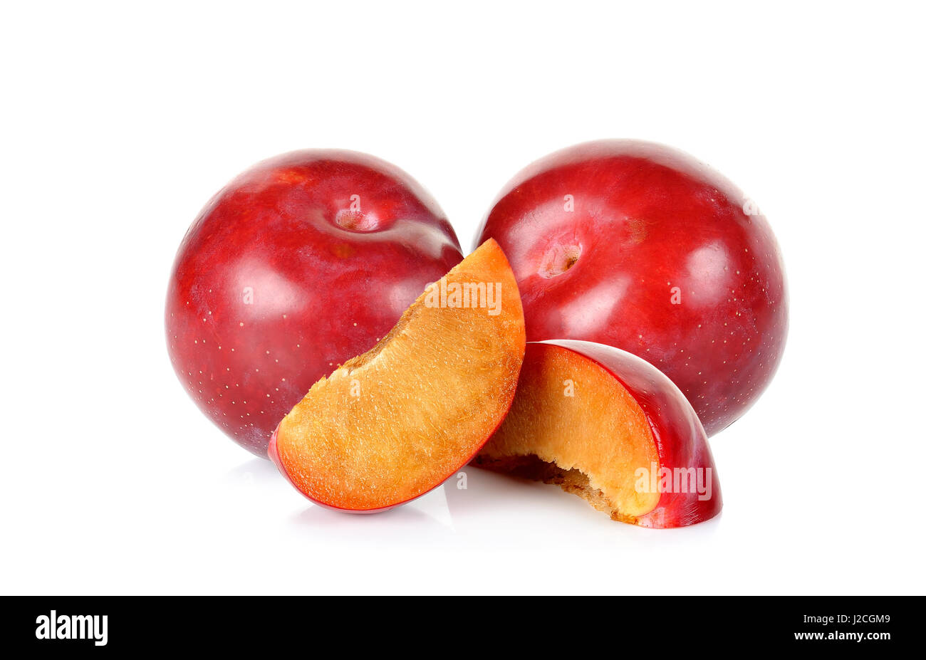 Red plum fruit with sliced isolated on white background Stock Photo - Alamy