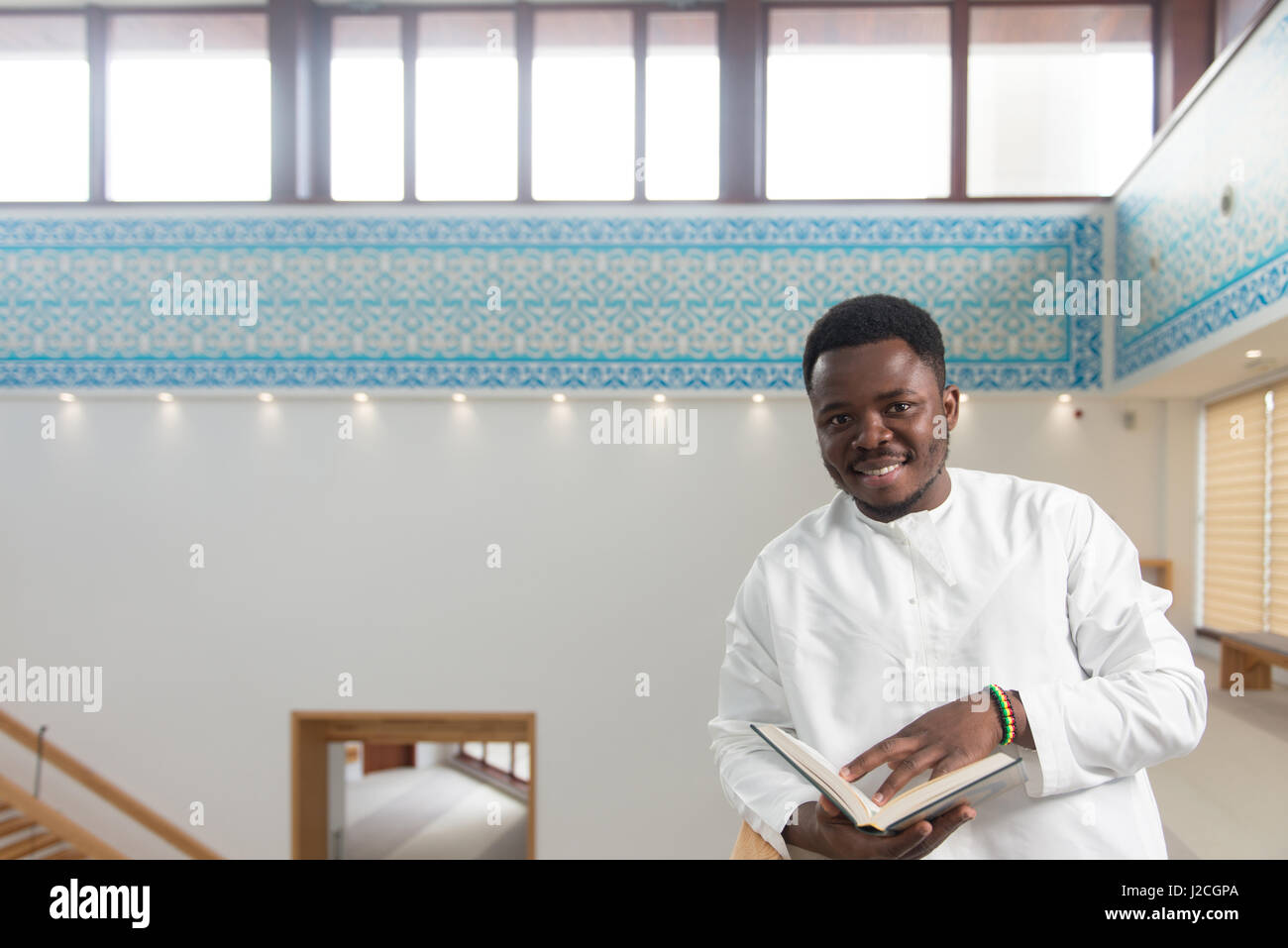 Muslim man quran african young hi-res stock photography and images - Alamy