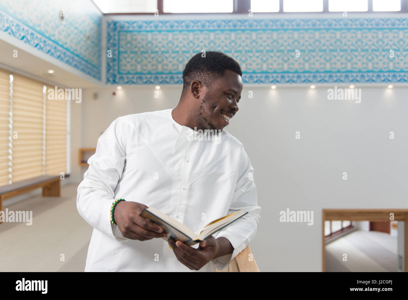 Muslim man quran african young hi-res stock photography and images - Alamy