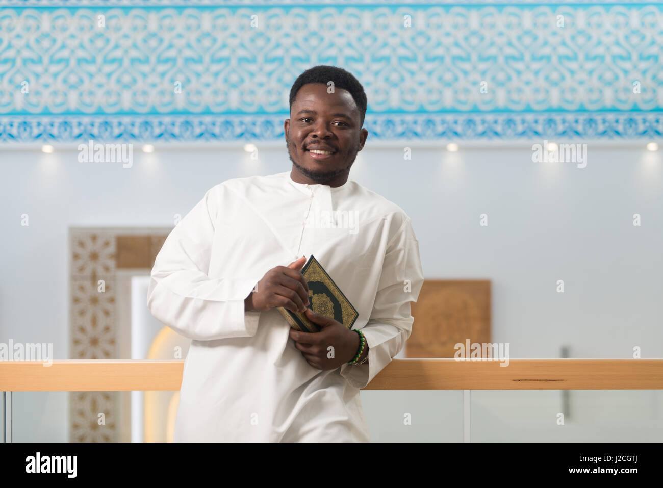 Black African Muslim Man Reading Holy Islamic Book Koran Stock Photo ...