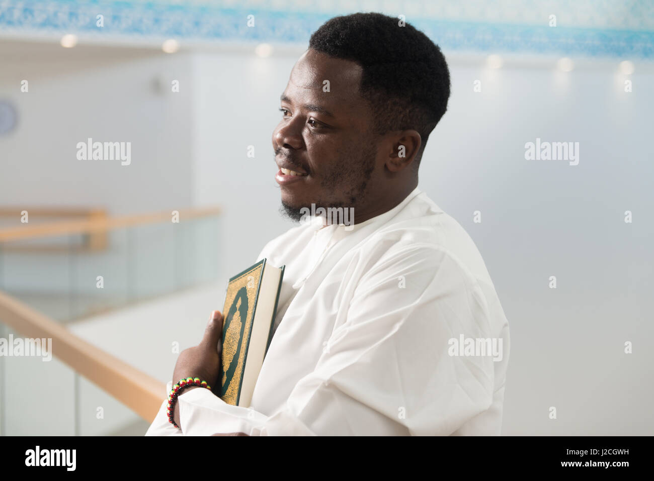 Black African Muslim Man Reading Holy Islamic Book Koran Stock Photo ...