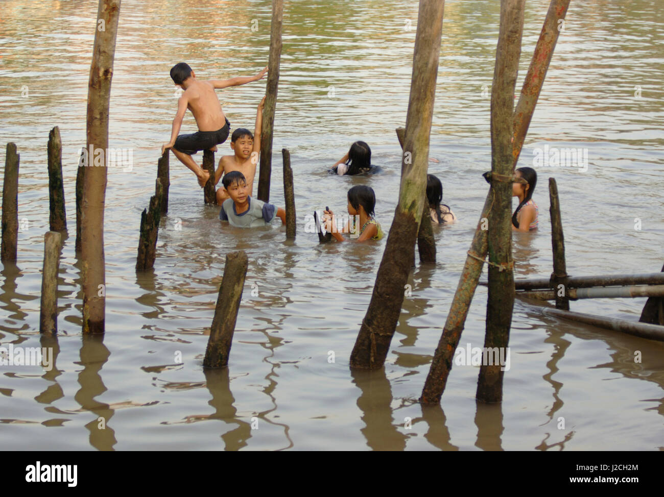 Asia, Vietnam. Children swimming in the Mekong River, Can Tho Stock ...