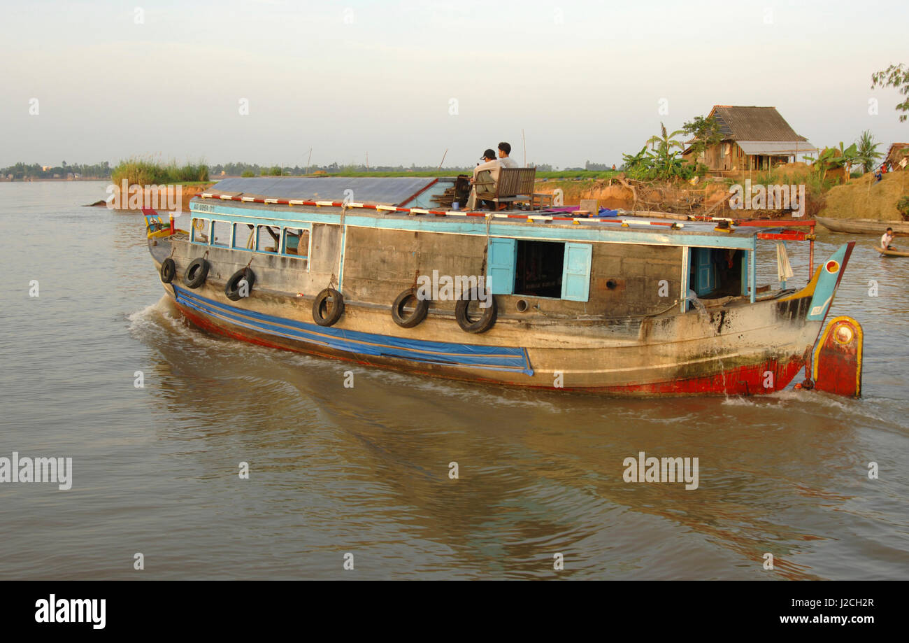 Asia, Vietnam. Traditional Vietnamese river boat in the Mekong Delta ...