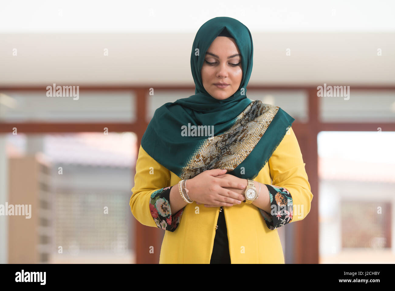 Muslim Woman Making Traditional Prayer To God In Mosque Stock Photo - Alamy