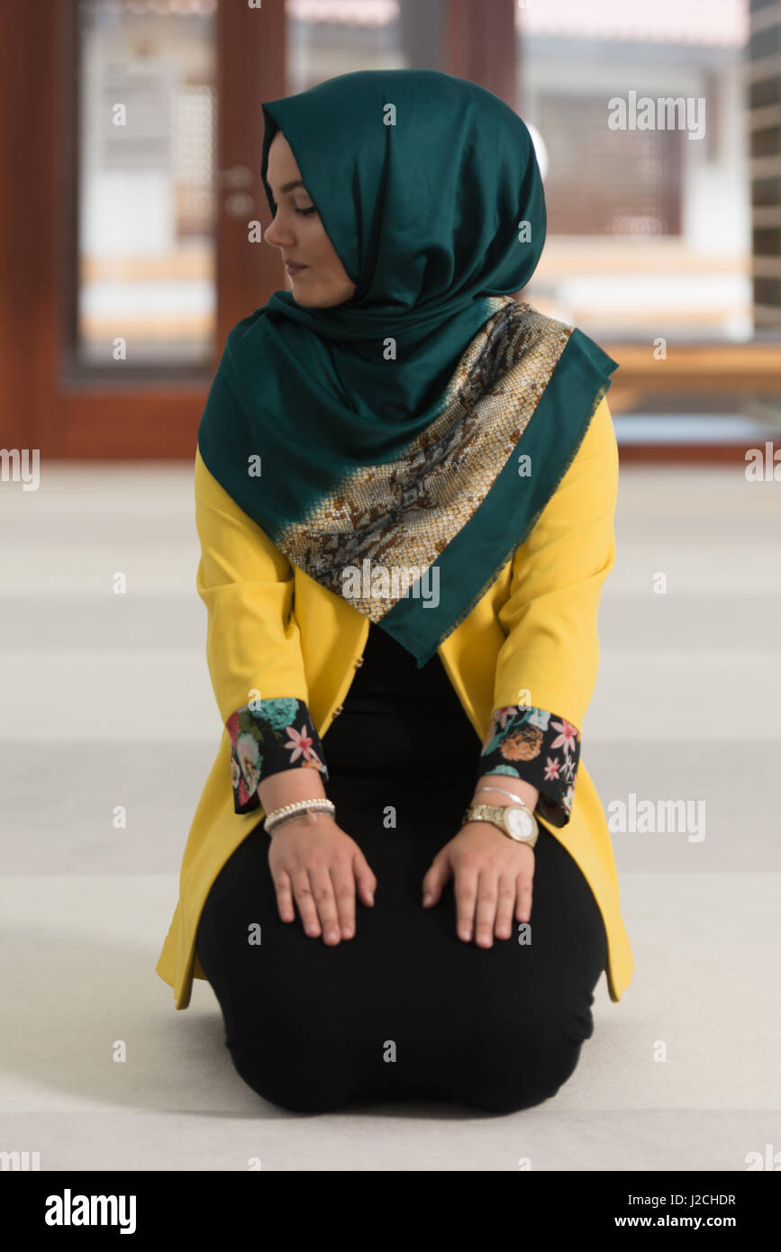 Muslim Woman Making Traditional Prayer To God In Mosque Stock Photo - Alamy
